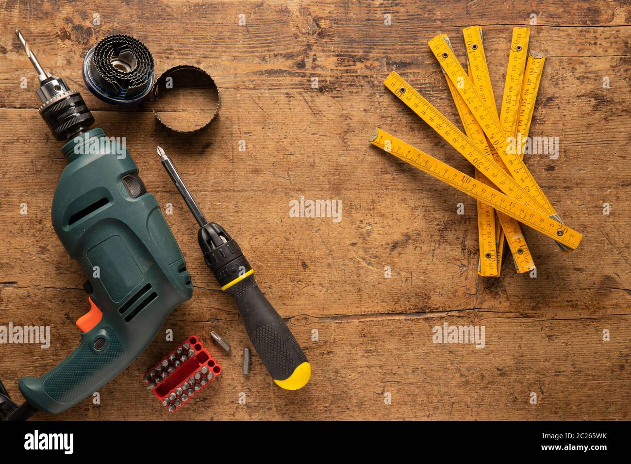 Overhead view of a workbench with hand tools and a drill Stock Photo ...