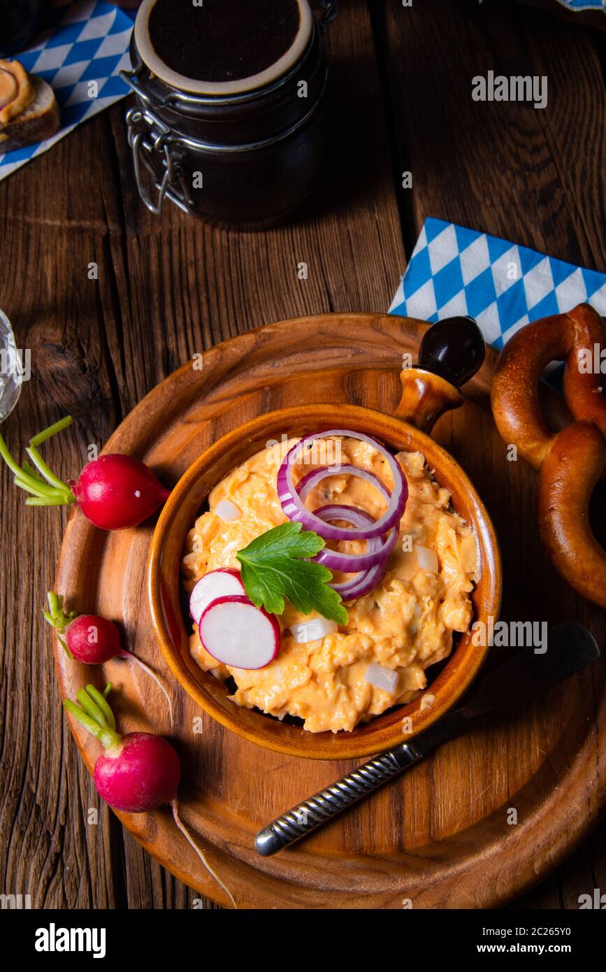 rustic Bavarian obazda with radishes and onions Stock Photo - Alamy