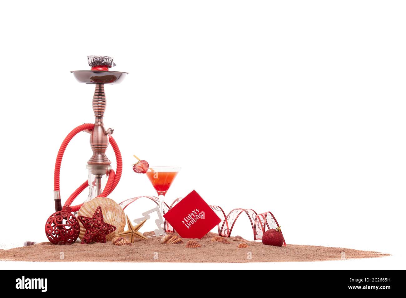Festive beach still life: glass with cocktail, hookah (shisha ...