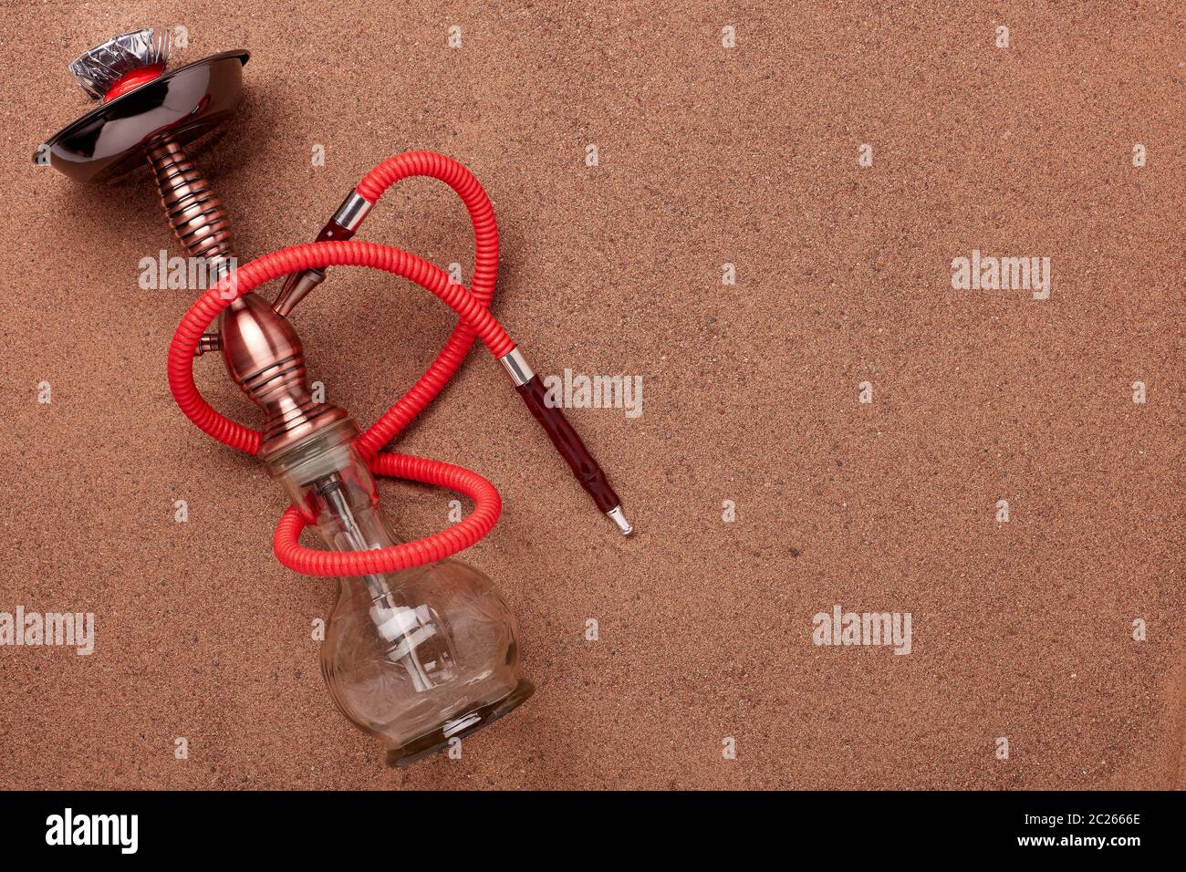 Turkish hookah (shisha) on a sand background Stock Photo - Alamy