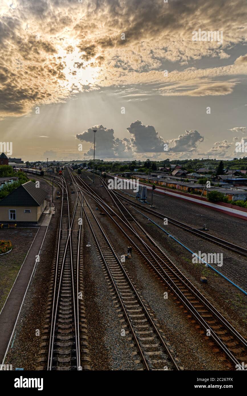 View of the railway tracks going into the distance. The sky before ...