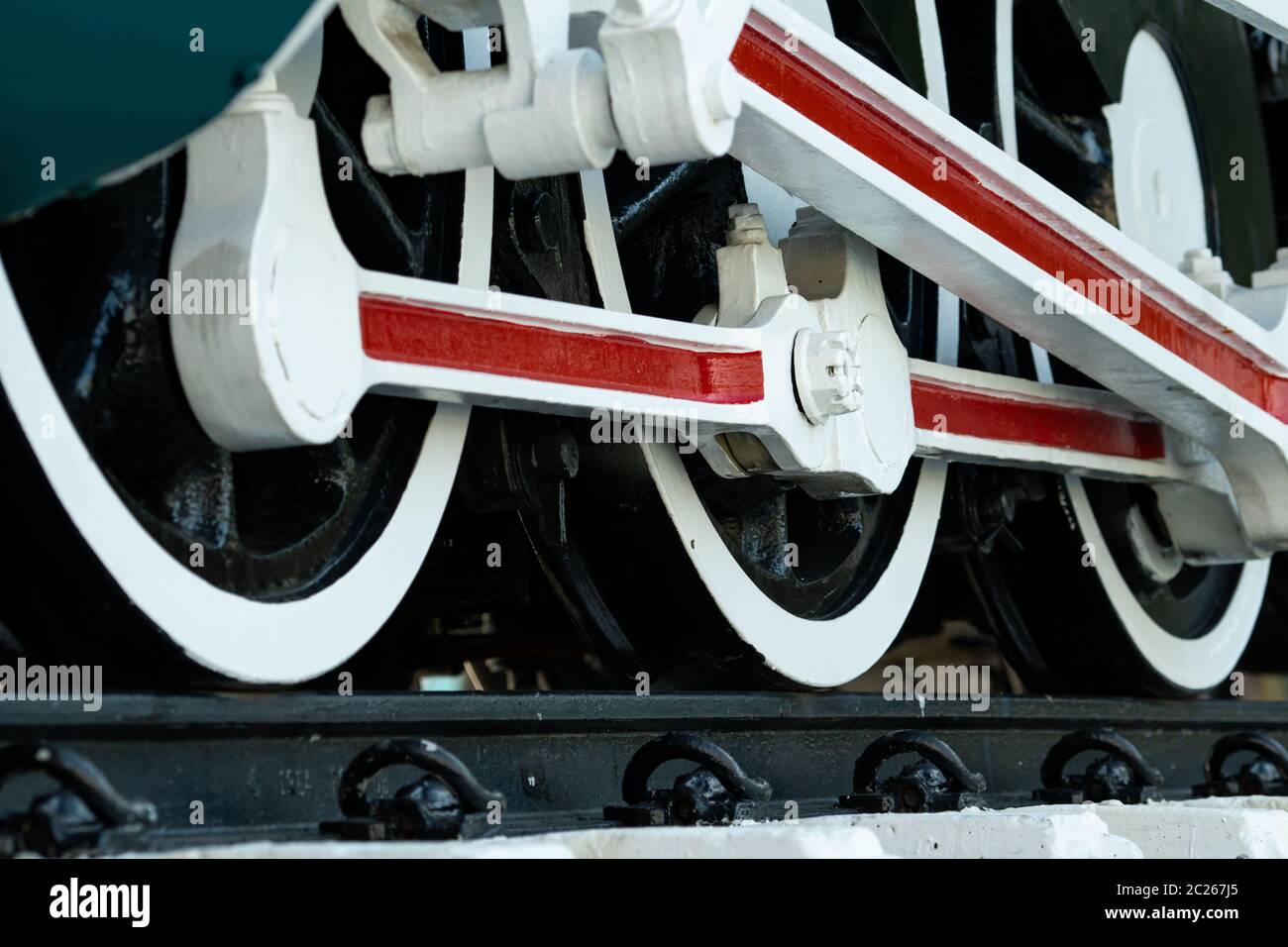 Closeup wheel of train. Green red and white train. Antique vintage ...