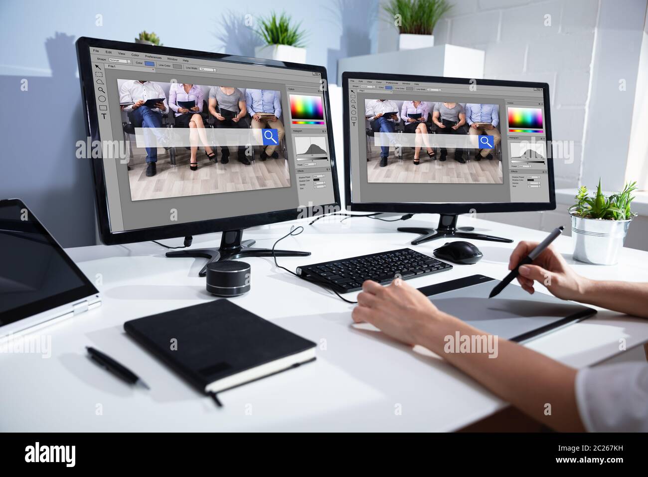 Female Editor Working With Photos On Computer Stock Photo - Alamy