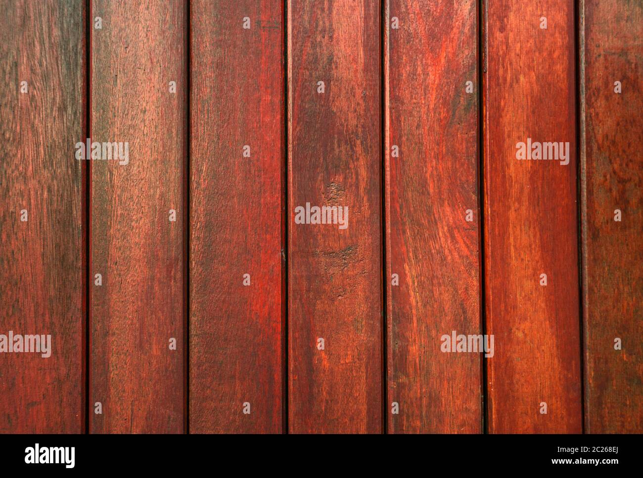 Closeup red wood with unique pattern texture background with copy space ...