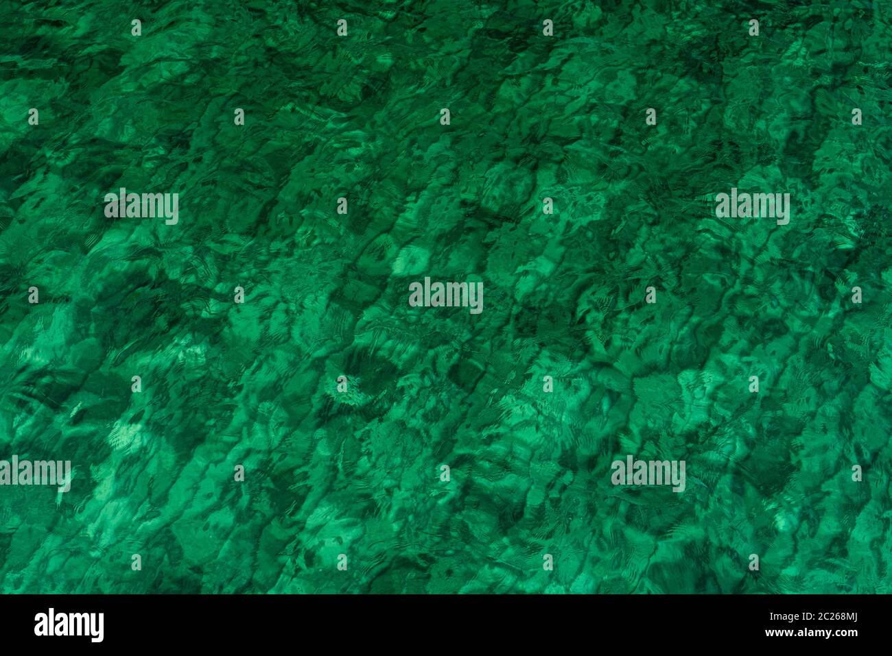 Green abstract texture background of emerald green sea water. Top view ...