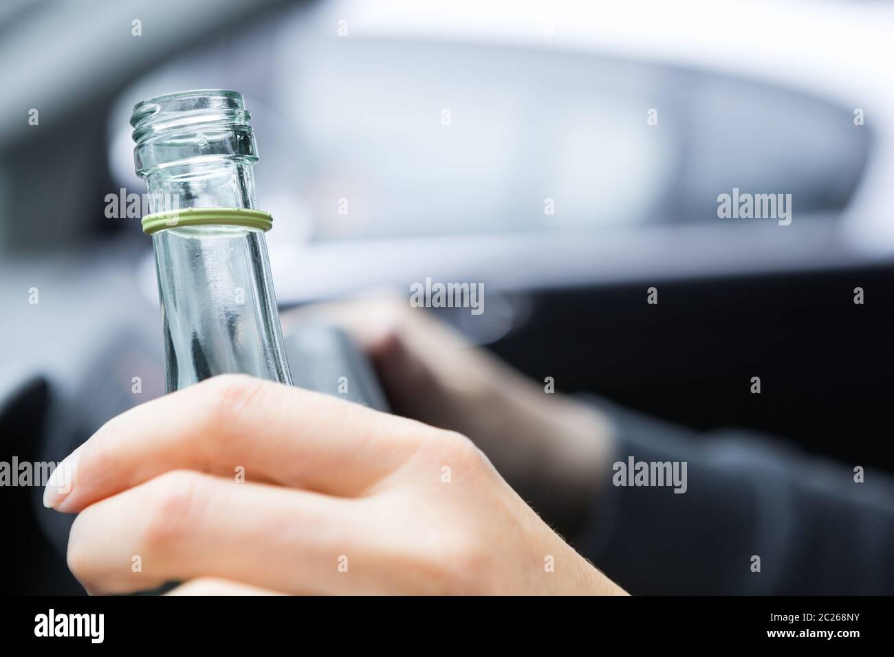 Drunk woman with wine bottle hi-res stock photography and images - Alamy