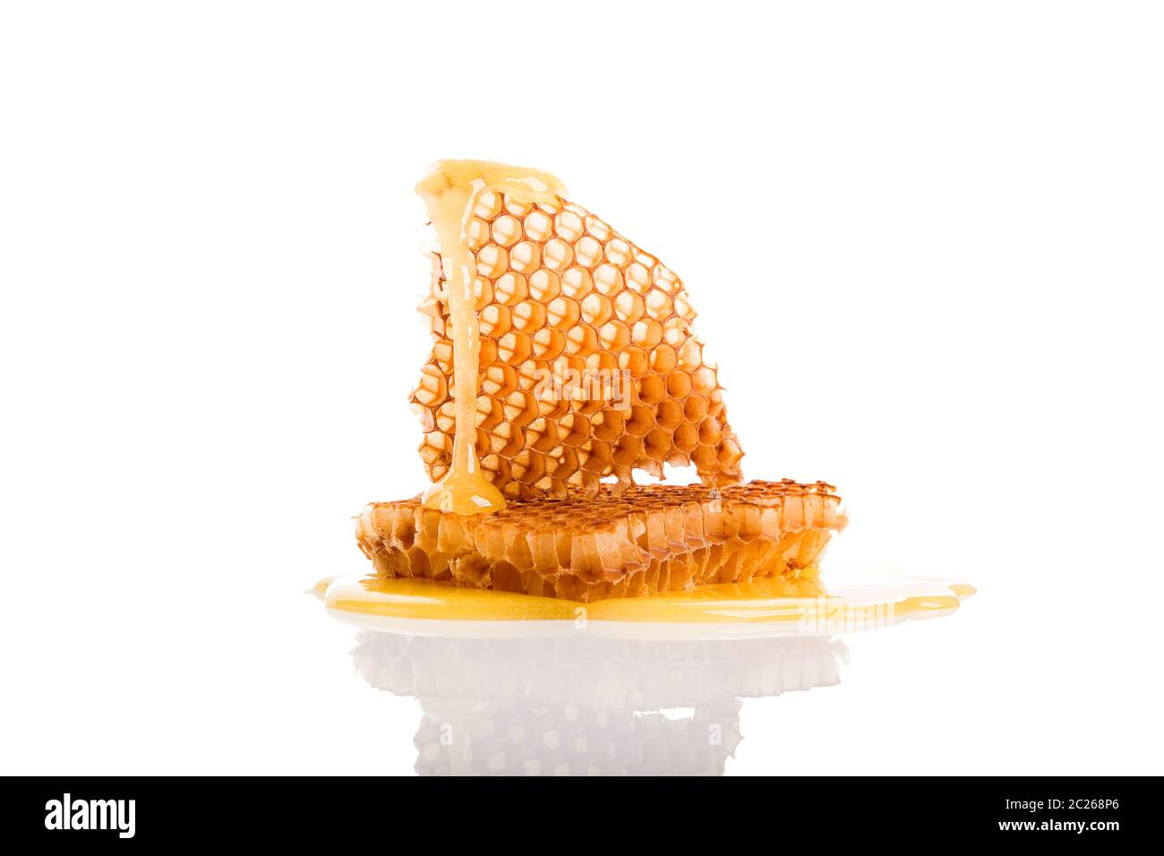 Honeycomb isolated on white background Stock Photo - Alamy