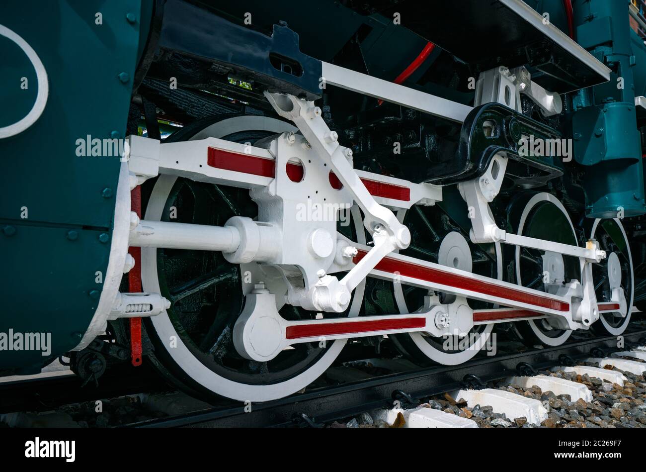 Closeup wheel of train. Green red and white train. Antique vintage ...