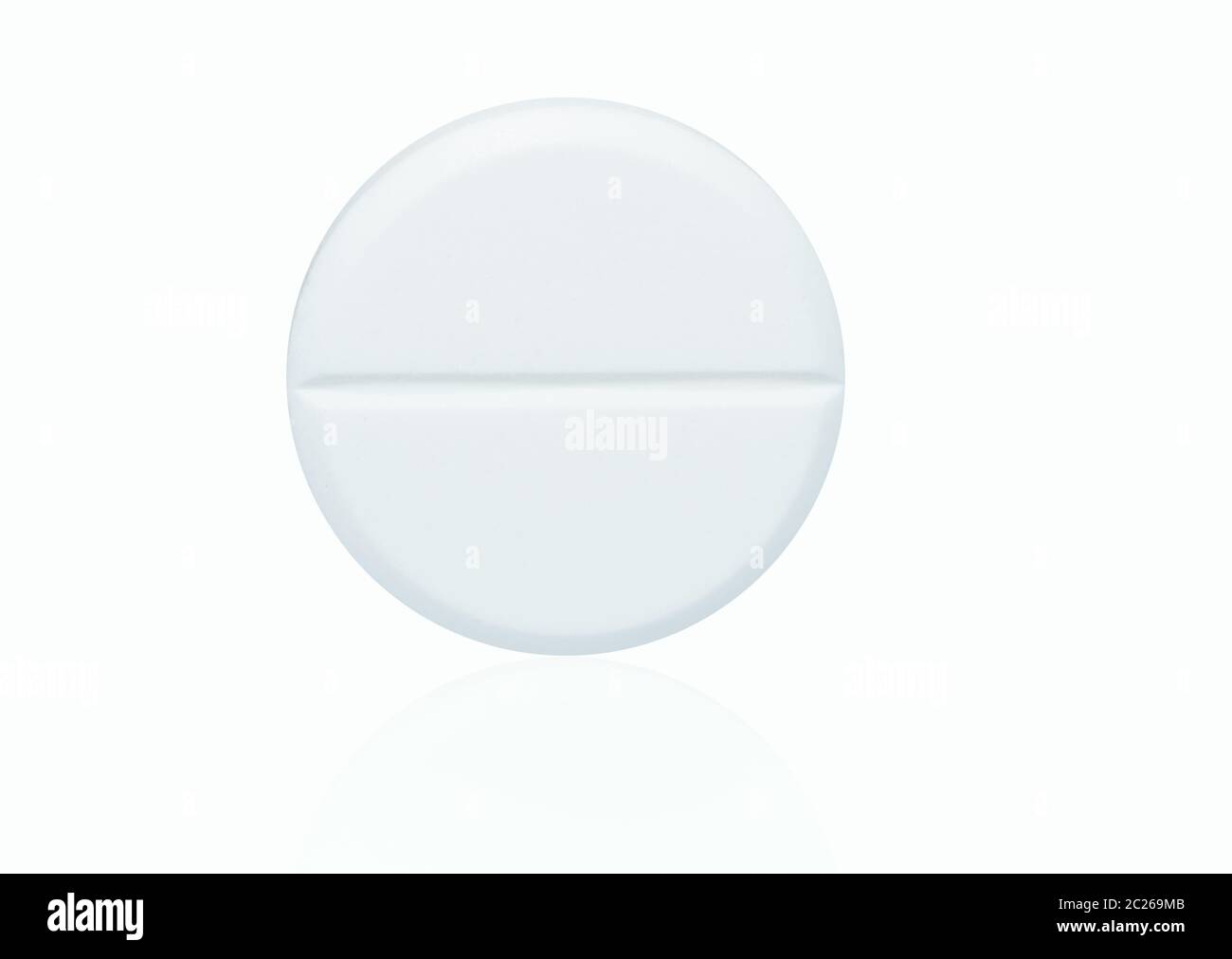 Macro shot of white chewable tablets pills on white background with ...