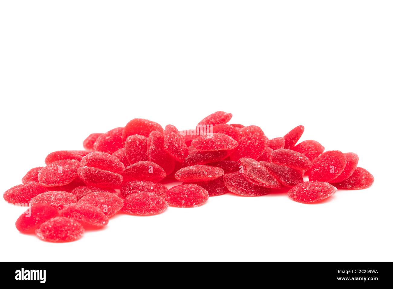 Pile of red vitamin pastille with clipping path. Multivitamin gummy for ...