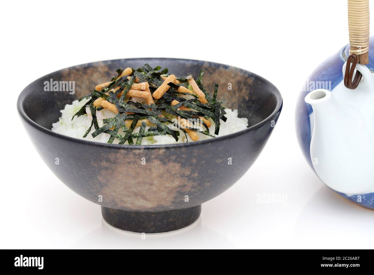 Japanese food, Rice chazuke with nori and snack, on white background ...