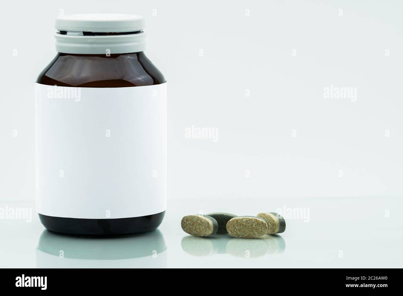 Vitamins, supplements and minerals dual layer tablets pills and ...