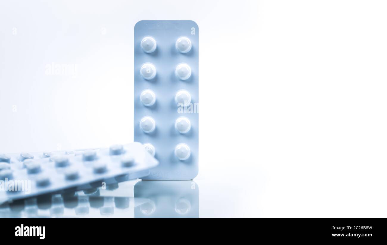 Colchicine 0.6 mg tablets pills in light resistant packaging isolated ...