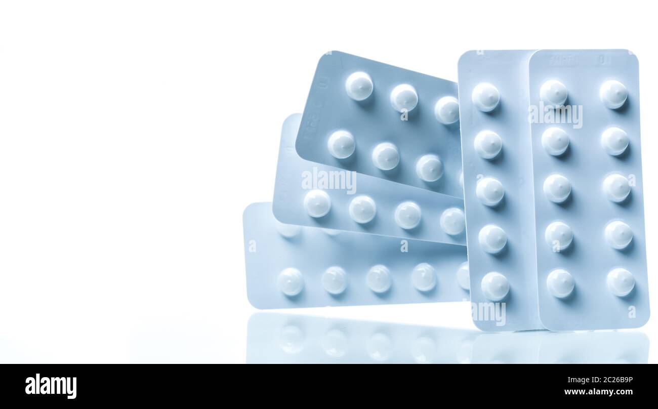 Colchicine 0.6 mg tablets pills in light resistant packaging isolated ...