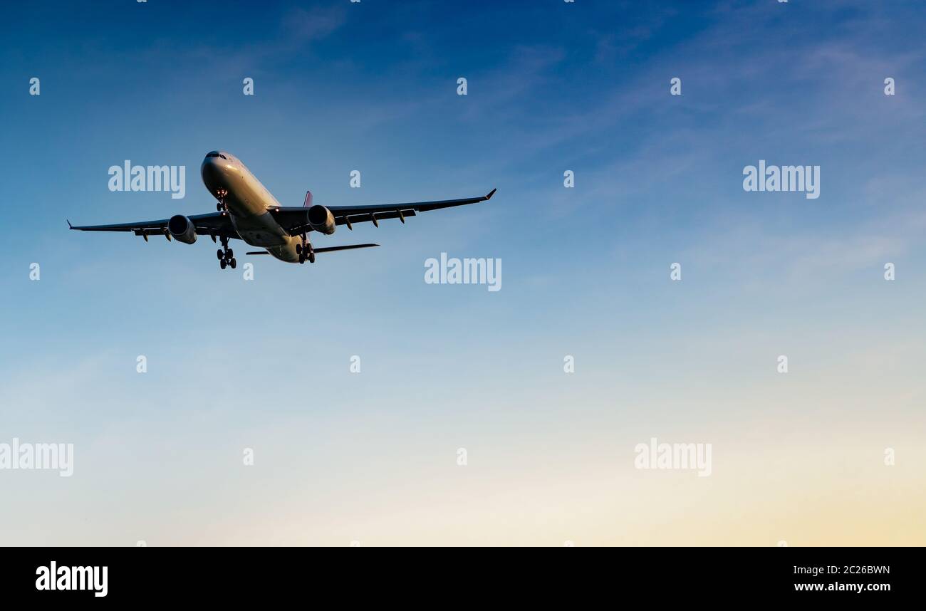 Commercial airline. Passenger plane landing at airport with beautiful ...