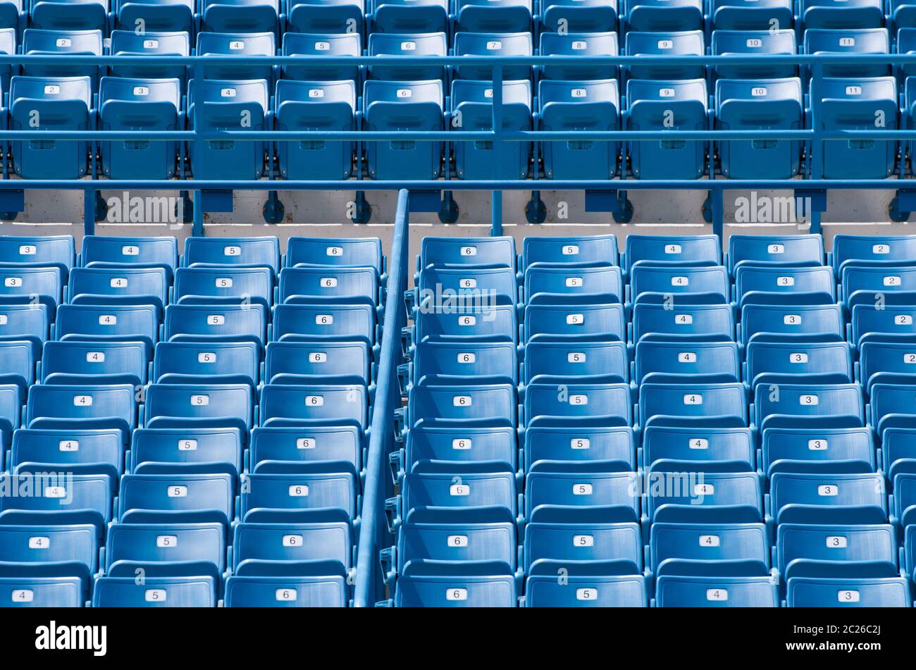 Blue seats in a sports stadium Stock Photo - Alamy