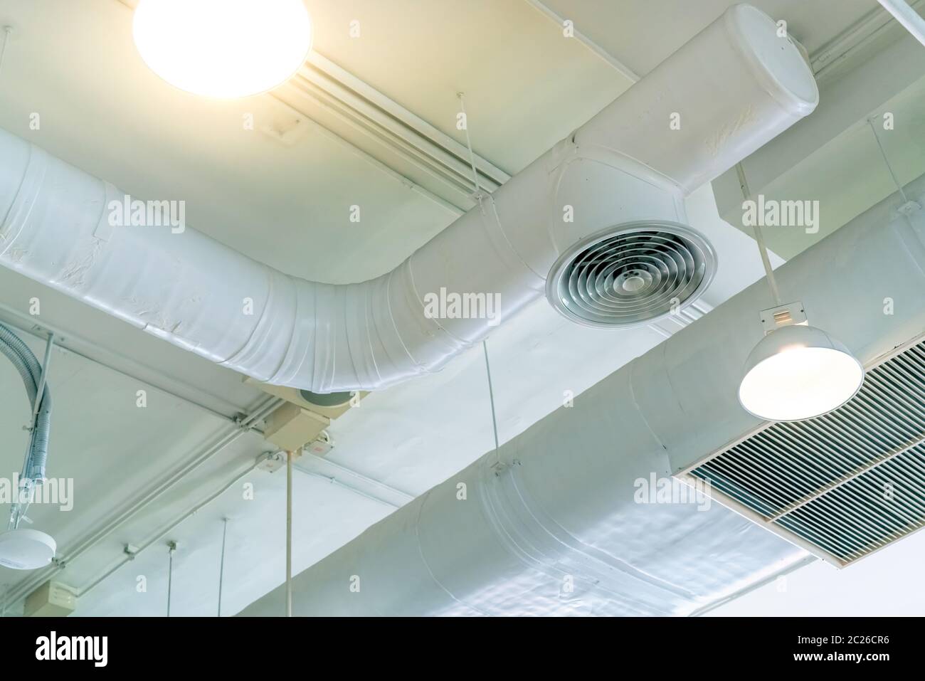 Air duct, wiring and plumbing in the mall. Air conditioner pipe, wiring ...