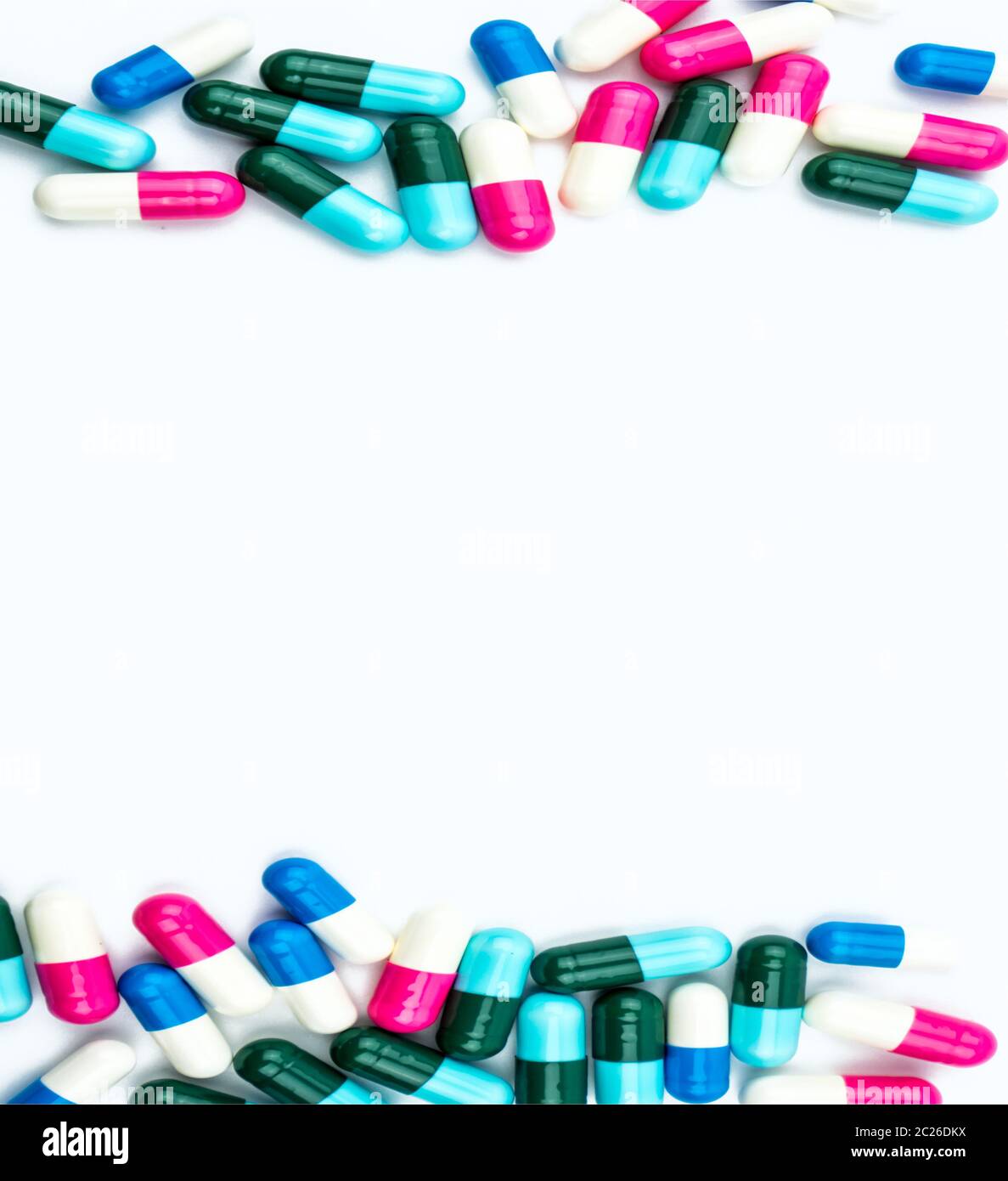 Colorful of antibiotic capsules pills isolated on white background with ...