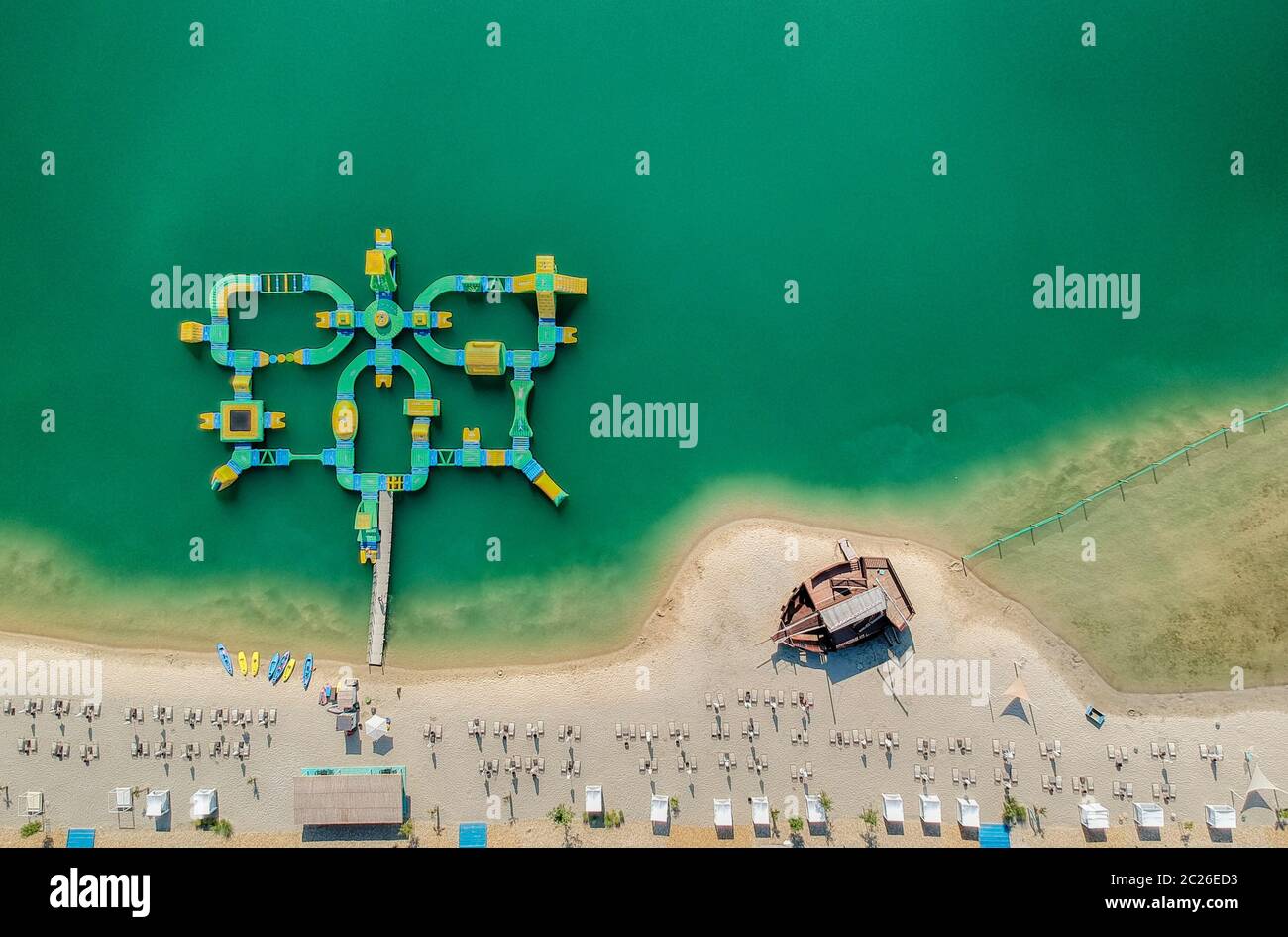 Aerial view of a beach and green water Stock Photo - Alamy