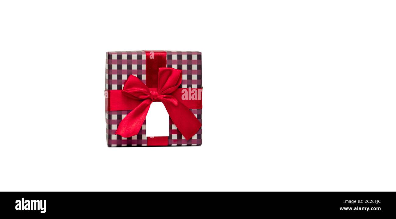 Plaid pattern gift box with red ribbon bow and blank greeting card ...