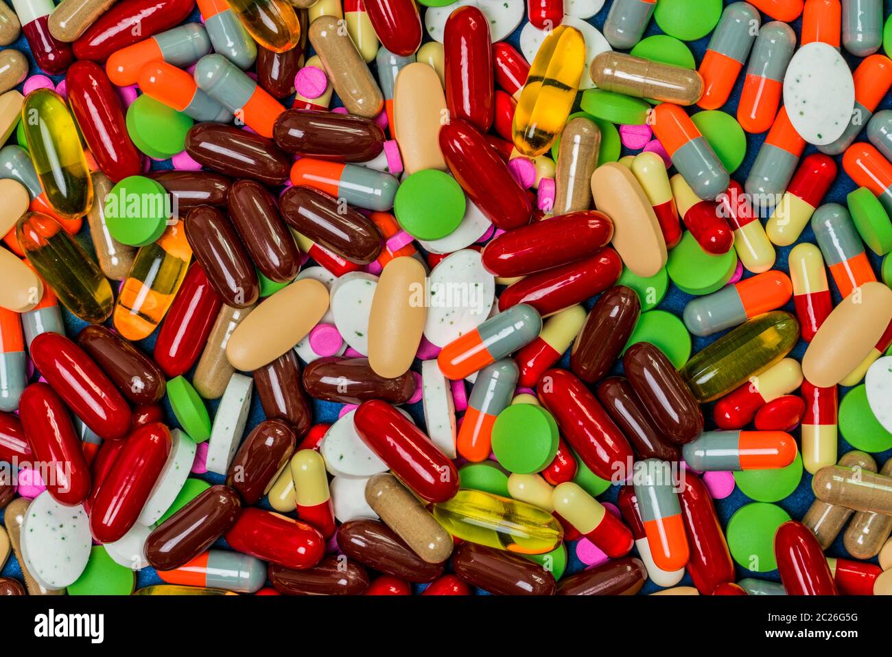 Pile of colorful tablets and capsule pills. Full frame of medicine ...