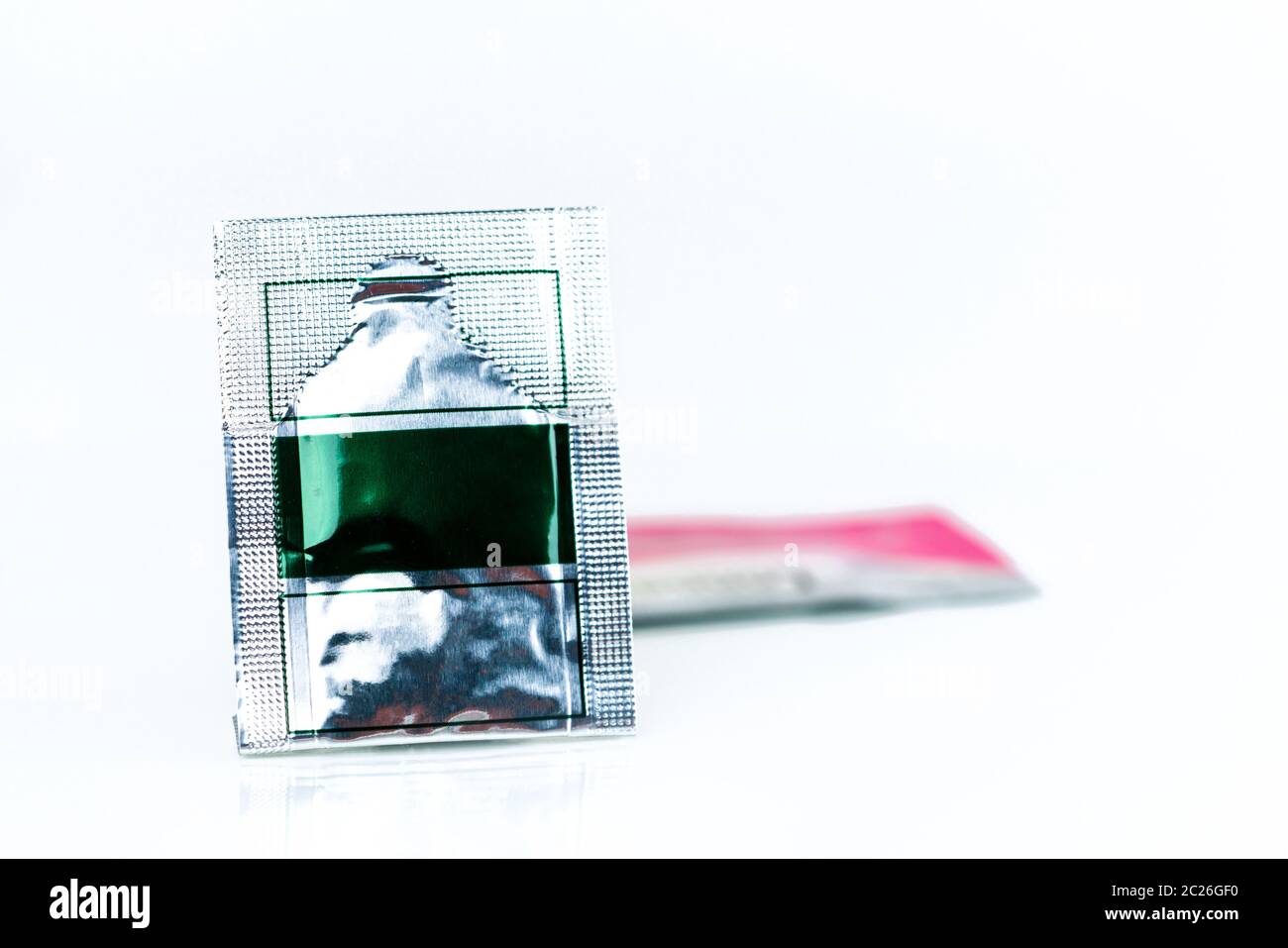 Mild steroid oral paste in aluminium foil sachet on blur background of ...