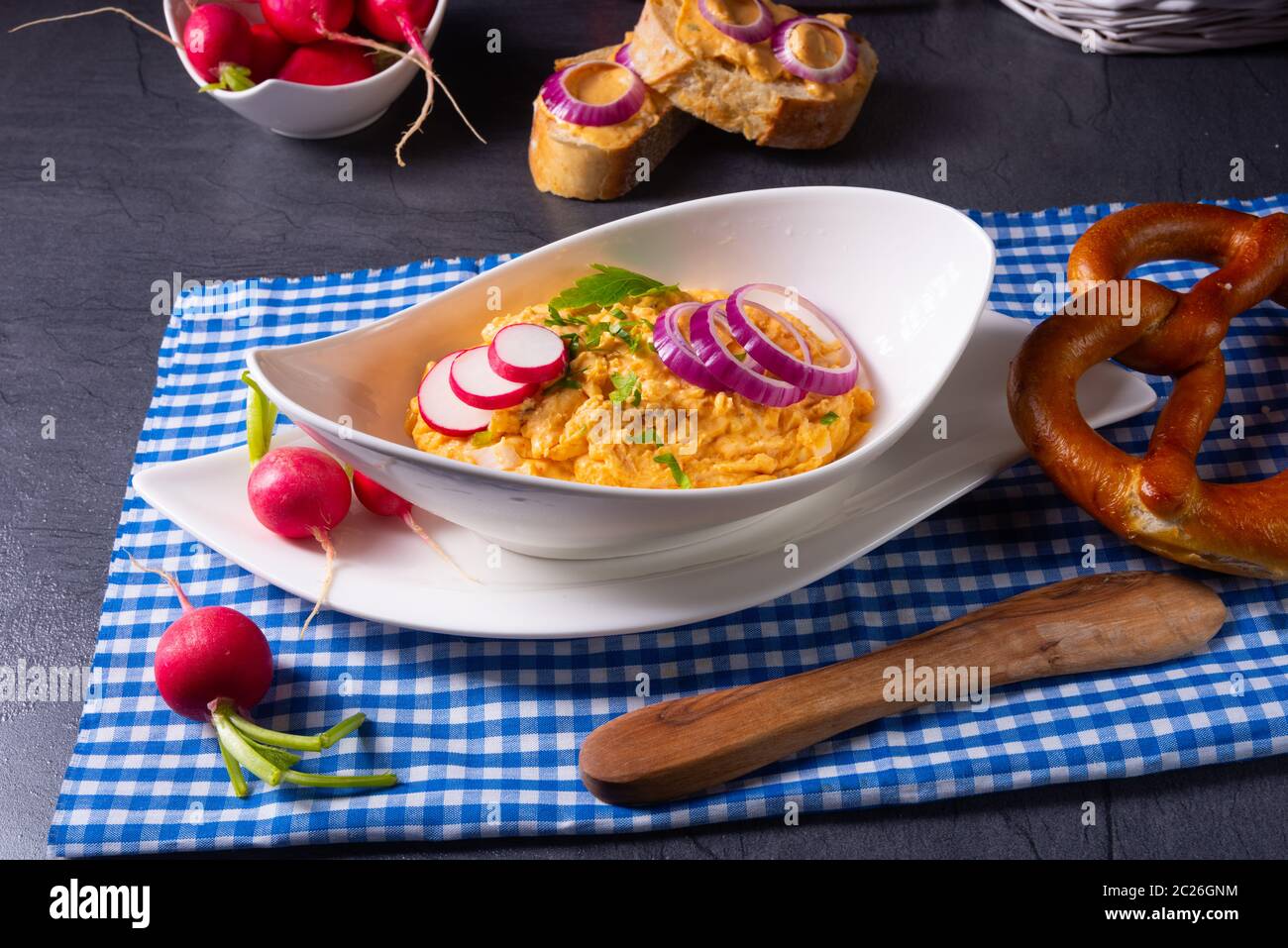 The perfect Bavarian obazda with radishes and onions Stock Photo - Alamy