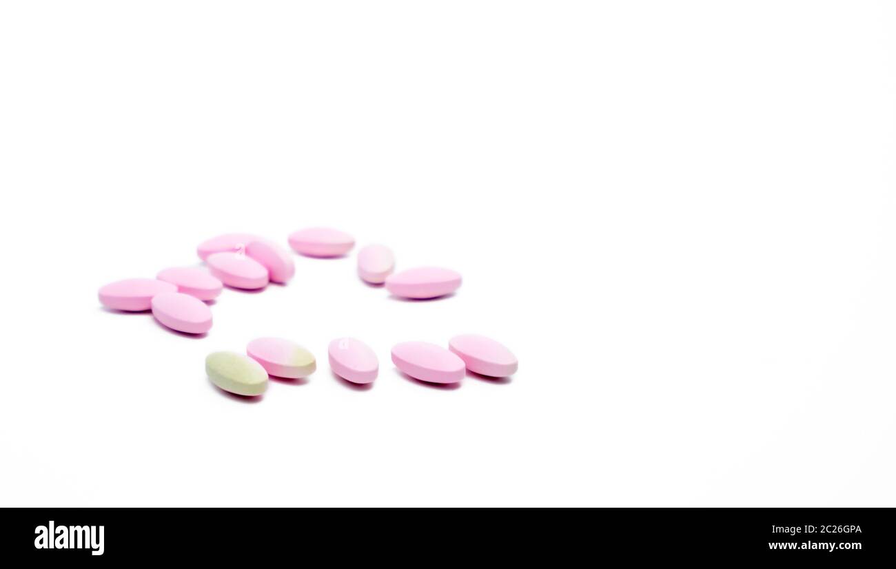 Expired calcium tablet pills with color change isolated on white ...