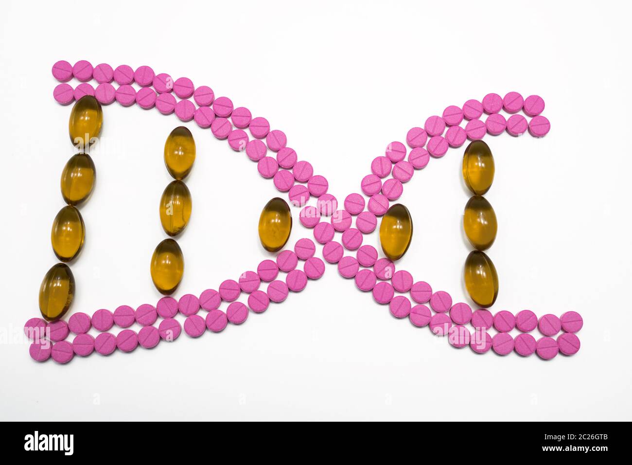 Shape of DNA made from pills, creative pills Stock Photo - Alamy