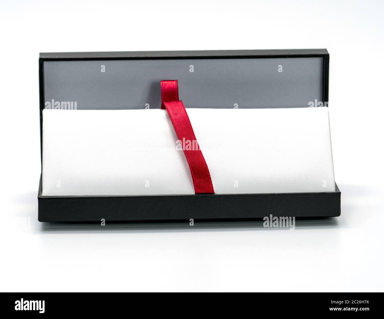 Pencil, pen gift box with ribbon, red cloth in the middle of the box ...