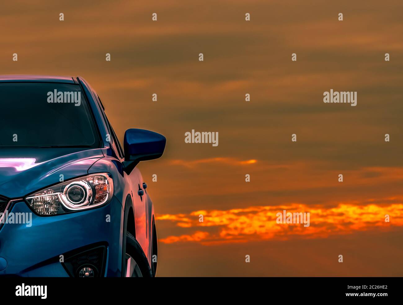 Front view of blue compact SUV car with sport and modern design parked ...