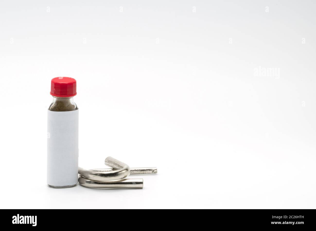 Thai herbal powder snuff in classic bottle with red cap and two snuff ...