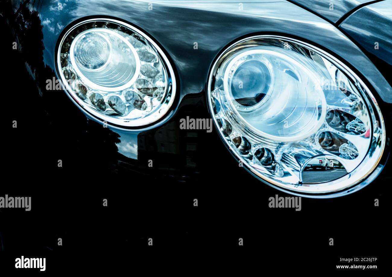 Closeup detail of LED headlight luxury car. Beautiful modern elegance ...