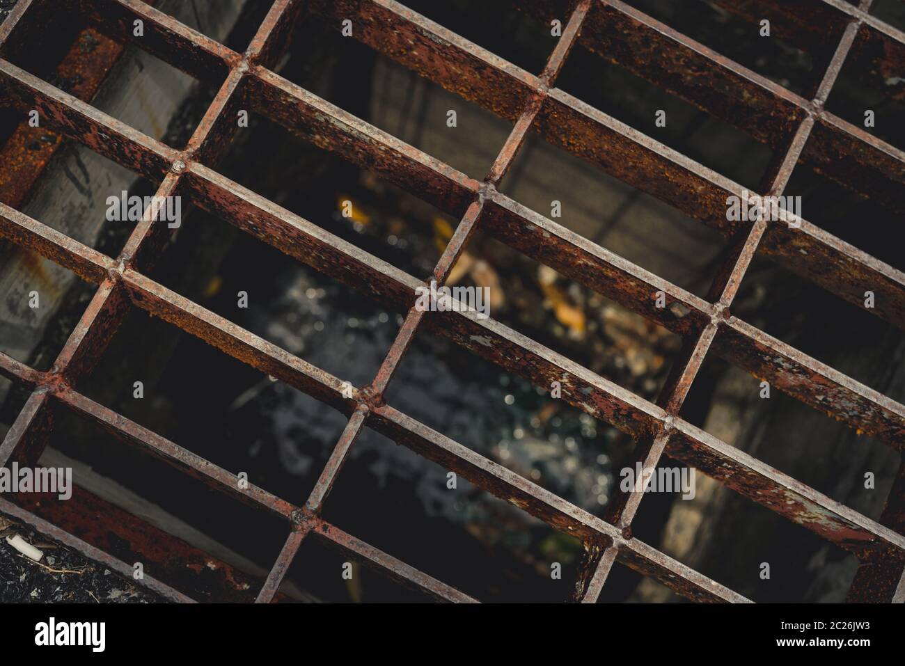 Top view of old and rusty metal covered on street drain hose. Rust ...