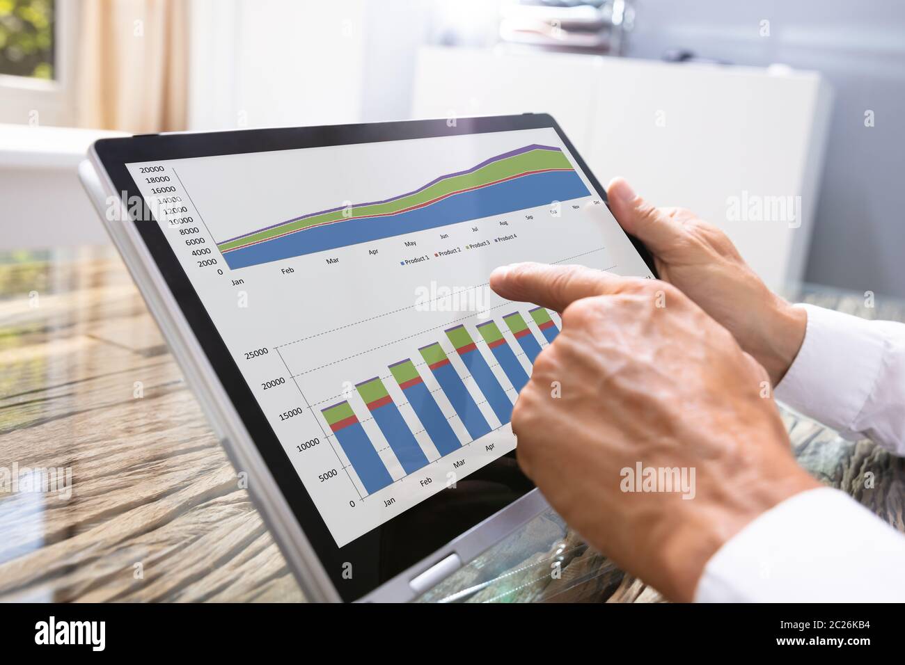 Close-up Of Hands Holding Digital Tablet With KPI Dashboard Chart Stock ...
