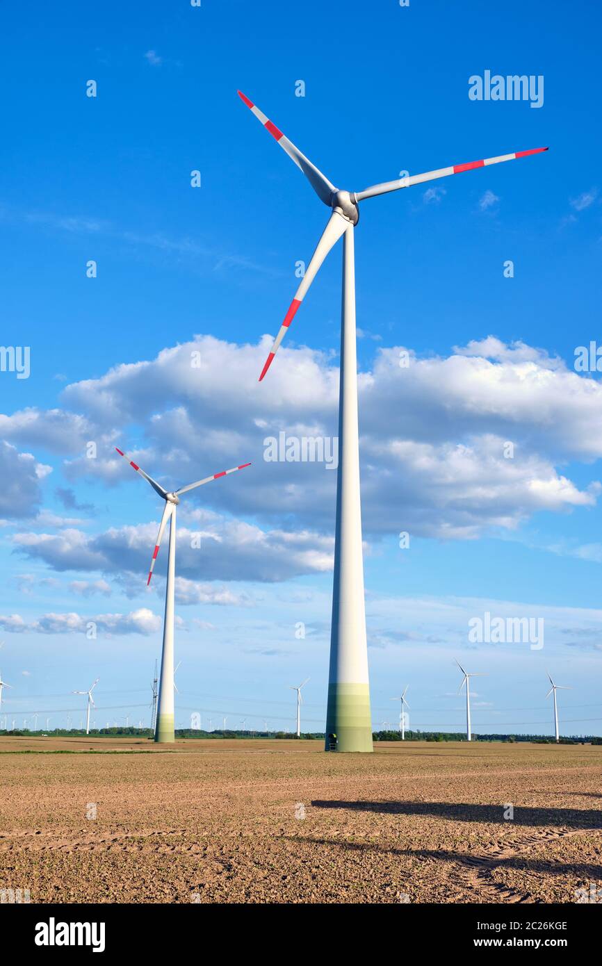 Wind wheels in a barren field seen in Germany Stock Photo - Alamy