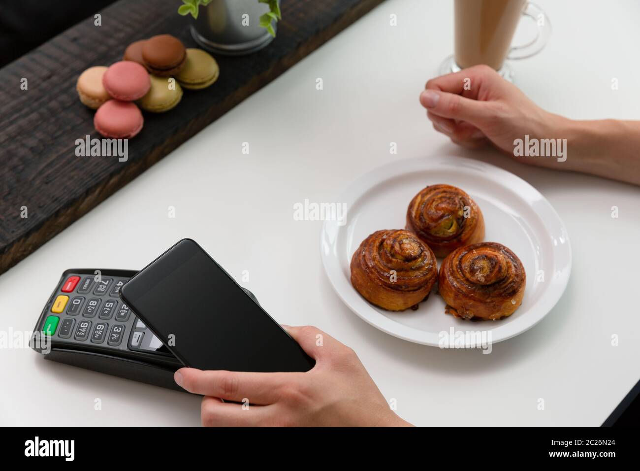 Hand holding smartphone making nfc hi-res stock photography and images - Alamy