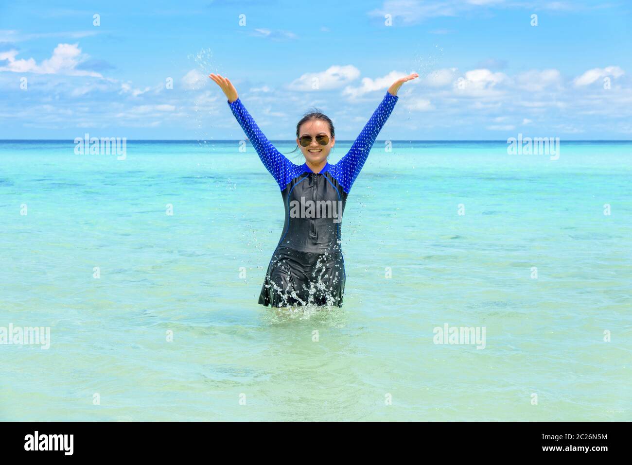 People splashing sea hi-res stock photography and images - Alamy