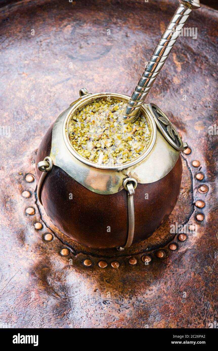Yerba mate in calabash and dry herb.Traditional argentinian beverage ...