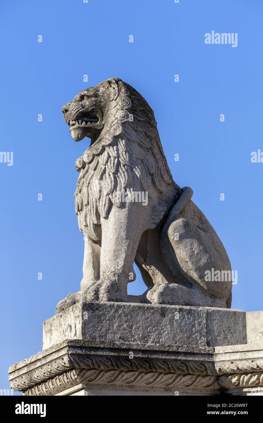 Stone lion statue Stock Photo - Alamy