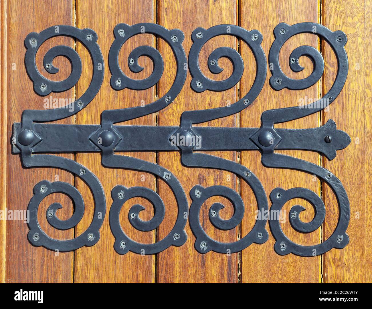 Decorative door hinge Stock Photo - Alamy
