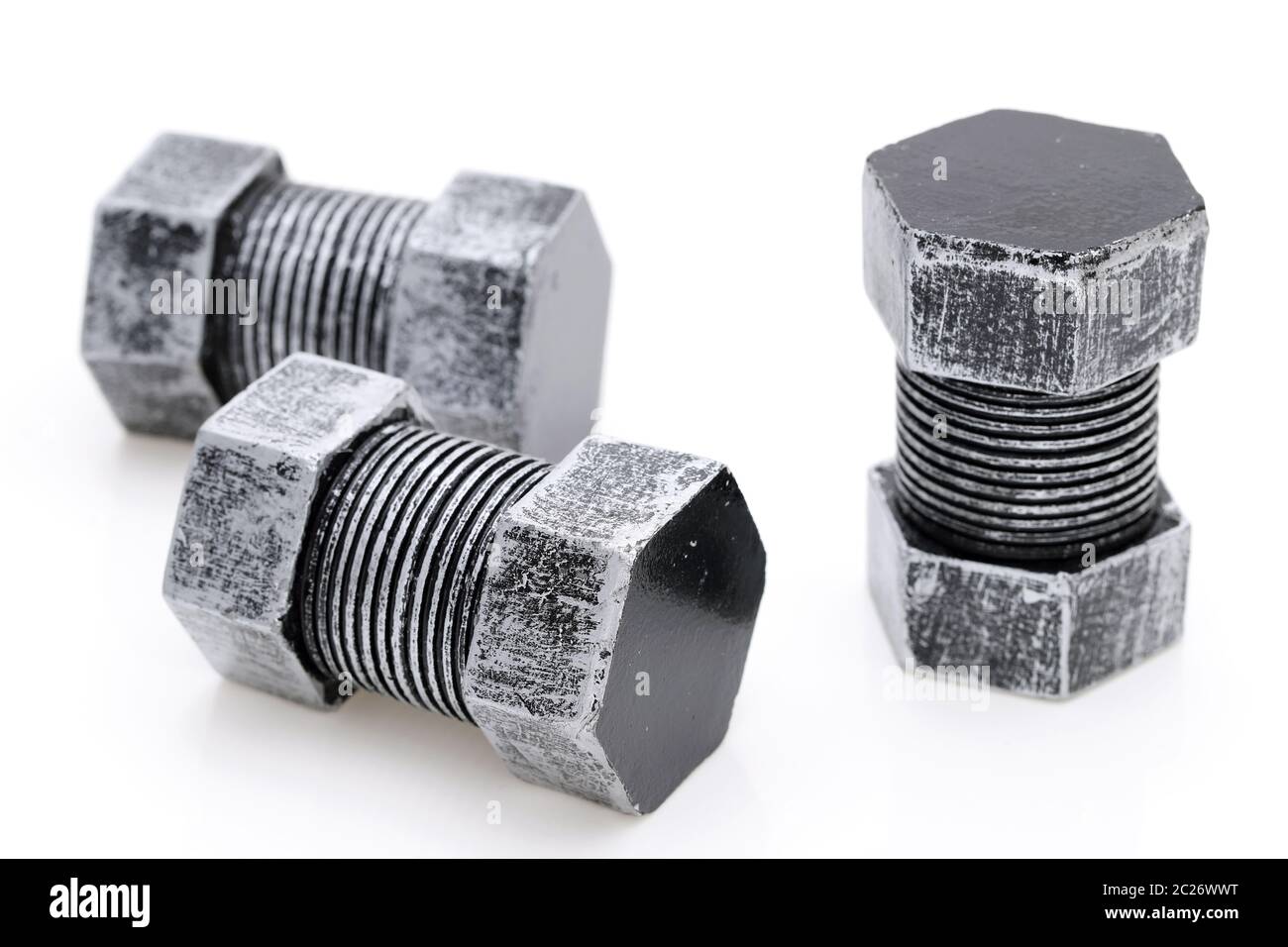 Dirty bolts and nuts isolated on white background Stock Photo - Alamy