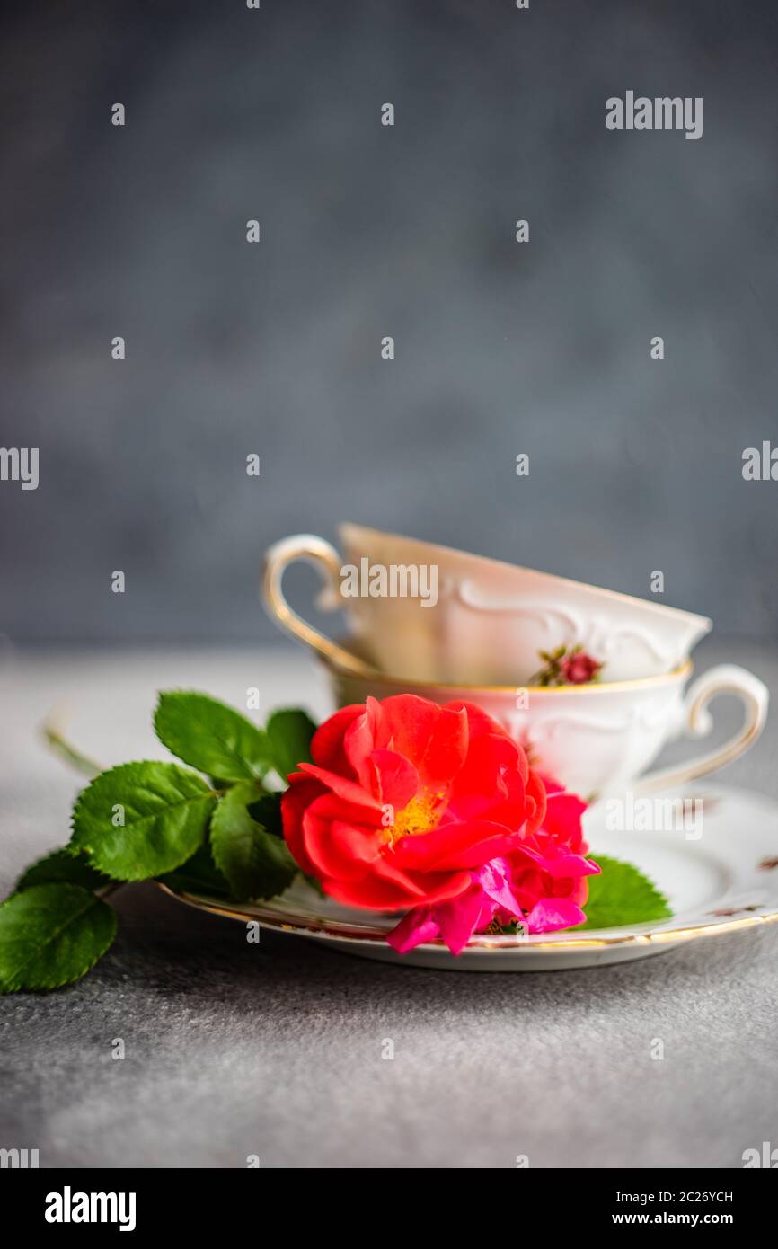 Tea set with red roses Stock Photo - Alamy