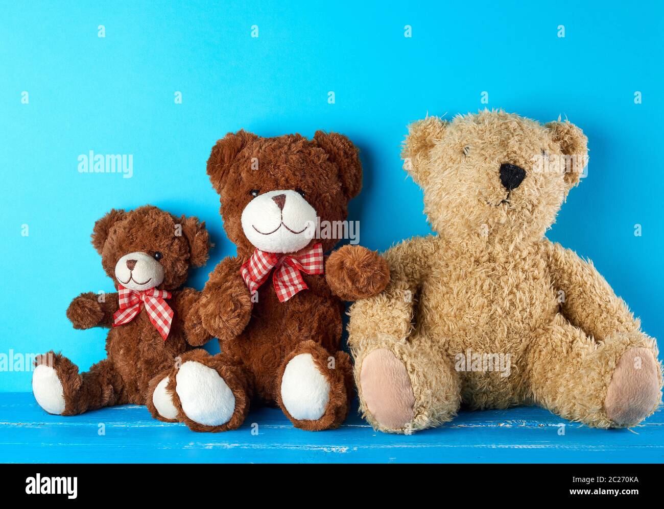 three teddy bears on a blue background, friendship concept, friendship ...