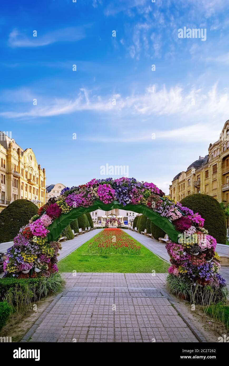 Flower arch on the square Stock Photo - Alamy