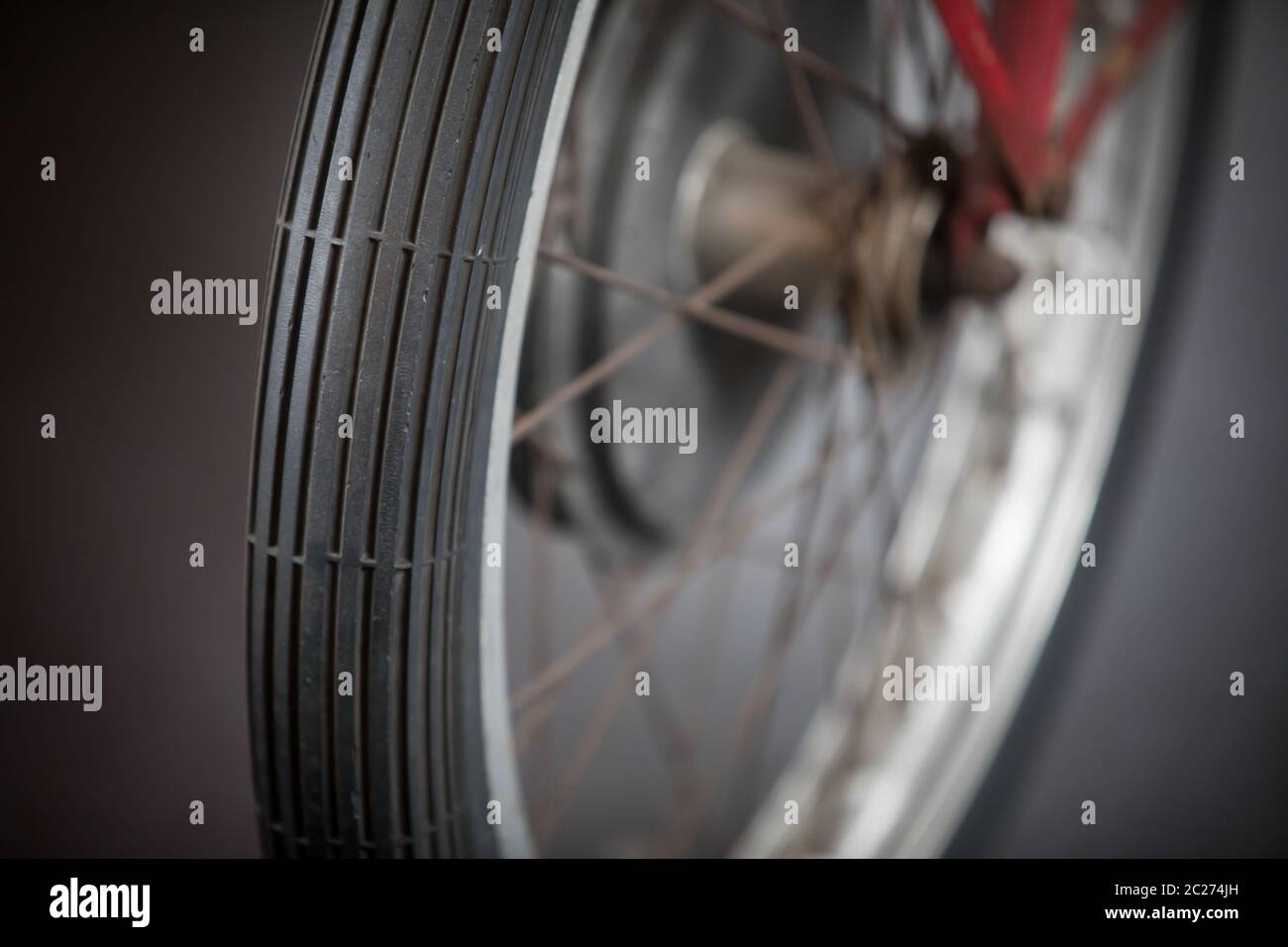 Color image of a vintage thin motorcycle wheel Stock Photo - Alamy