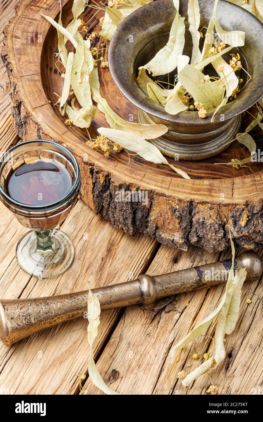 Herbal medicine.Healing tincture or decoction of linden flowers Stock ...