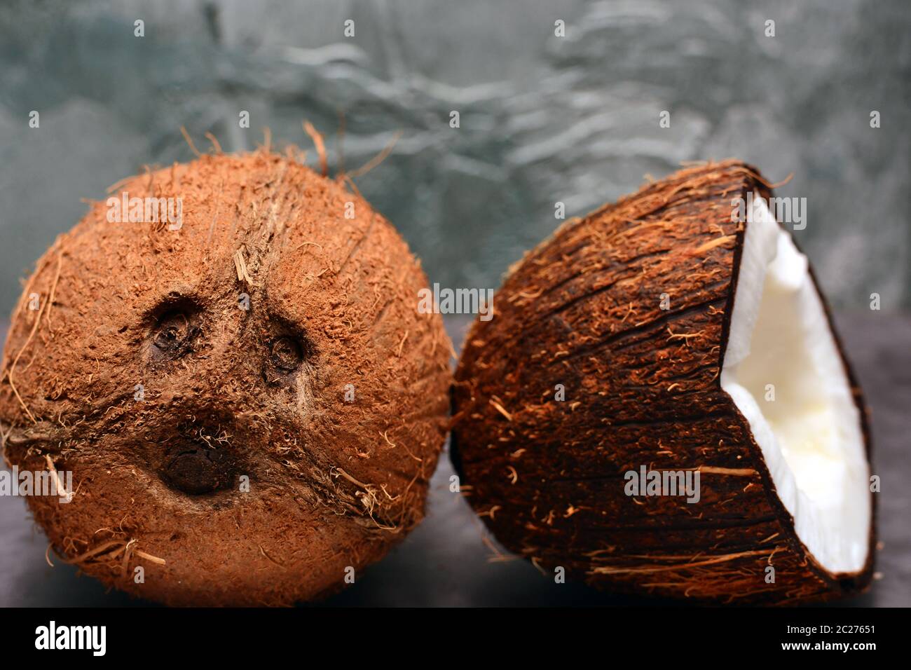 Cracked and whole coconuts. Summer tropical concept. Healthy eating and ...