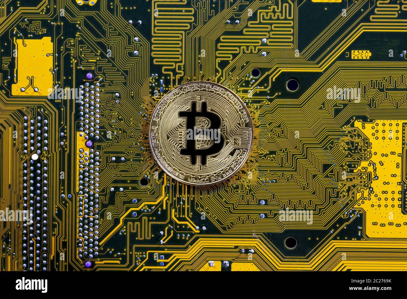 Bitcoin coin and printed circuit board PCB Stock Photo - Alamy