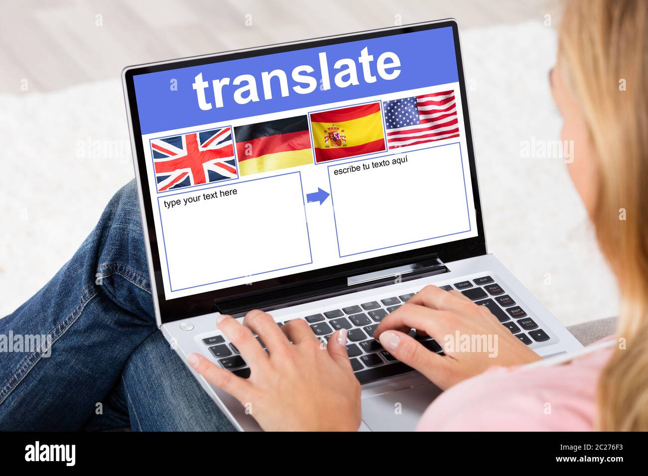 Woman Using Laptop Showing Language Translate Application With Country ...